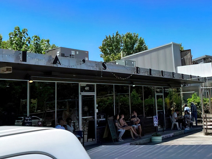 Sunshine bathes the patio where Atlanta locals gather, patiently waiting for their turn to experience breakfast nirvana.