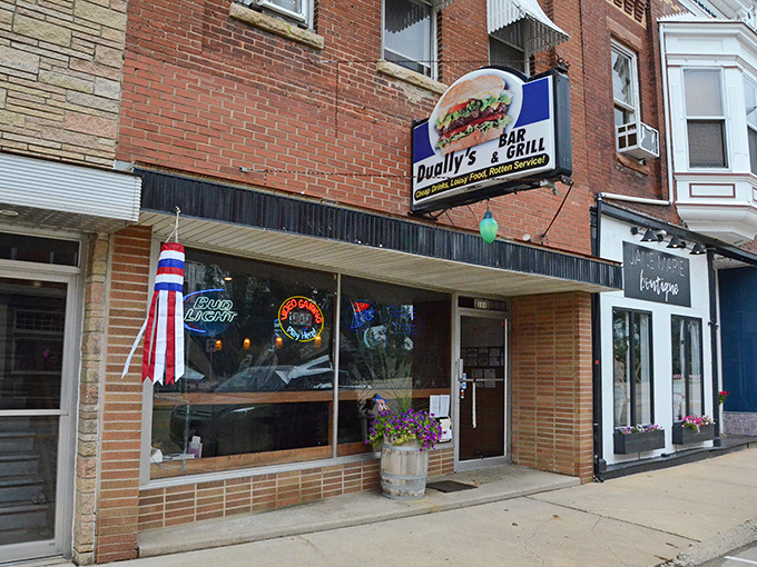 Small Town Saloon stands proudly on Elizabeth's Main Street, its unassuming brick facade hiding culinary treasures that locals have treasured for years.