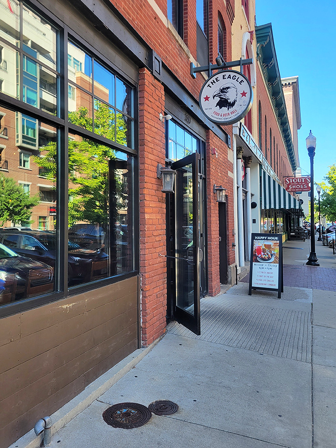 A sunny day on Mass Ave highlights The Eagle's classic signage&mdash;proof that good taste extends beyond just what's on your plate.