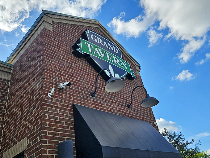 The brick facade and emerald sign of Grand Tavern stand as an unassuming beacon for food lovers. Michigan's hidden culinary treasures often wear the humblest disguises.