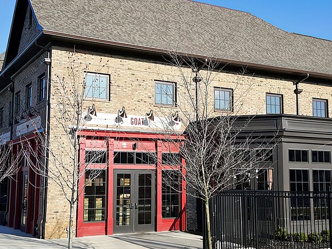 That red entrance practically winks at you from the street, promising good times and better food inside.
