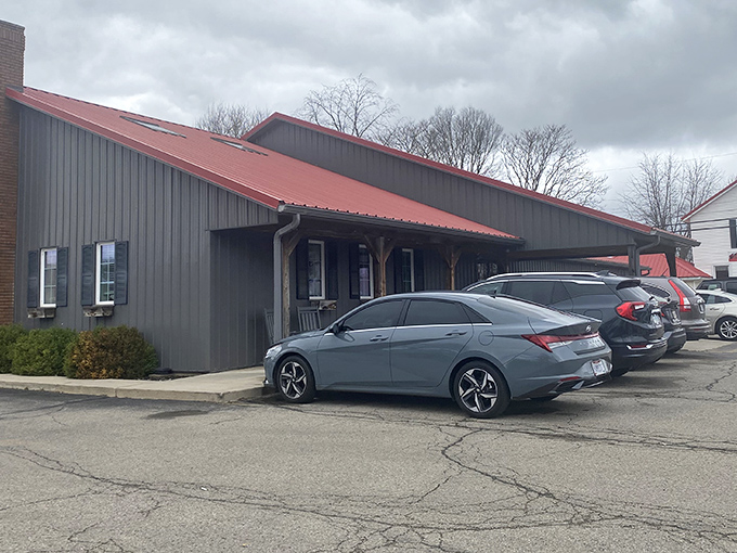 The iconic red roof of The Farmer's Daughter stands out like a beacon of comfort food promise in Urbana. Home-cooked favorites await inside this charming roadside gem.