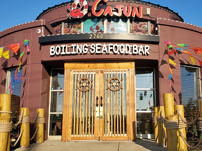 Another view of the exterior showcases the restaurant's distinctive nautical flair, with wooden posts and rope details setting the coastal mood.