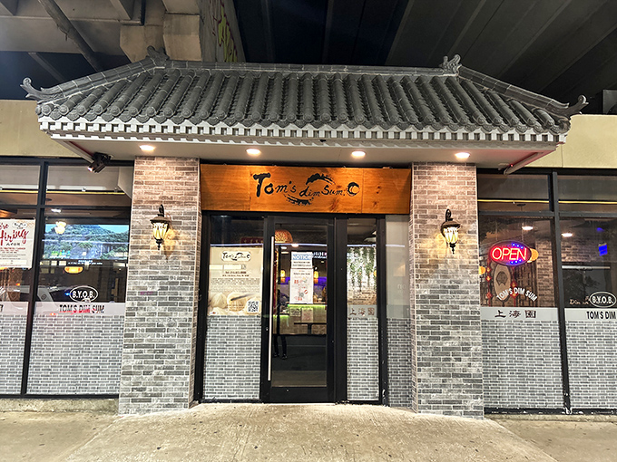 The unassuming exterior of Tom's Dim Sum hides culinary treasures behind that traditional pagoda-style roof. Like finding a Rolex in a cereal box.