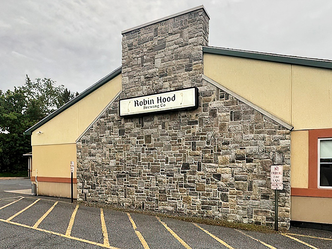 The stone facade of Robin Hood Brewing Co. stands like a modern-day Sherwood Forest fortress, promising culinary adventures rather than archery lessons.