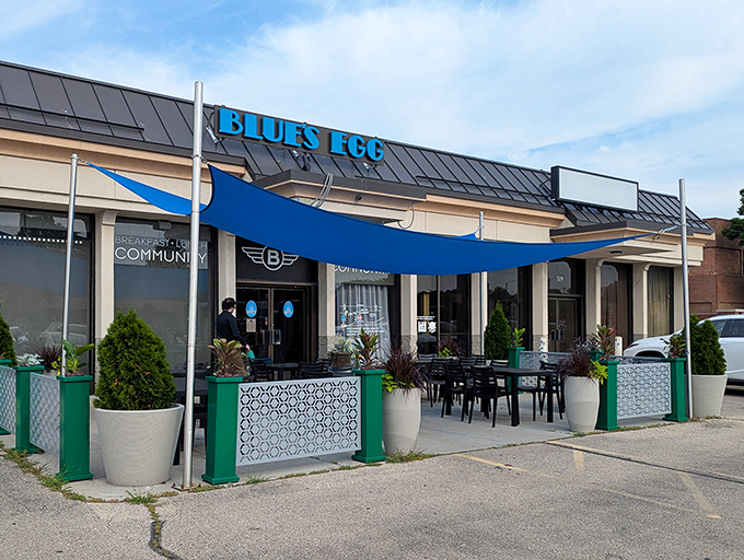 Blue's Egg announces its presence with that unmistakable azure awning, like a breakfast beacon calling you home on Milwaukee's west side.