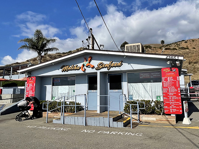 The unassuming white facade of Malibu Seafood stands like a beacon of hope for hungry travelers on PCH. No valet parking, just seafood paradise.