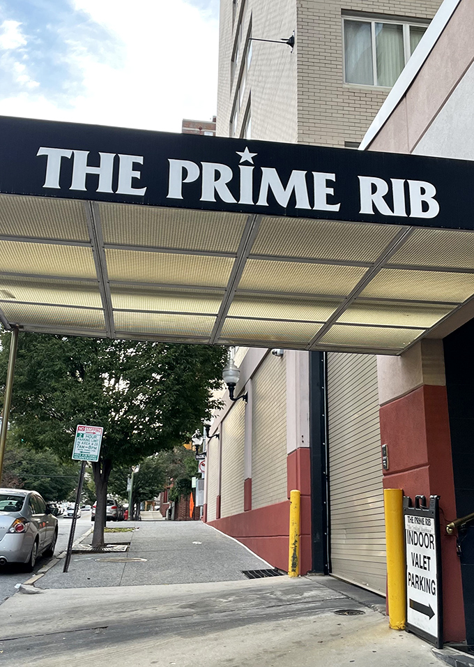 The unassuming entrance belies what awaits inside. Like finding a secret passage to carnivore heaven, this modest awning marks the spot where meat dreams come true.