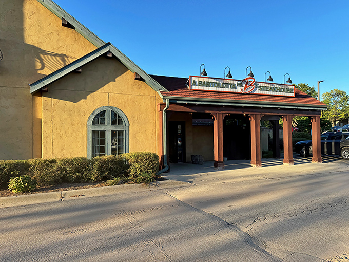 The warm terracotta exterior of Mr. B's welcomes you like an old friend who happens to know how to grill a perfect steak.