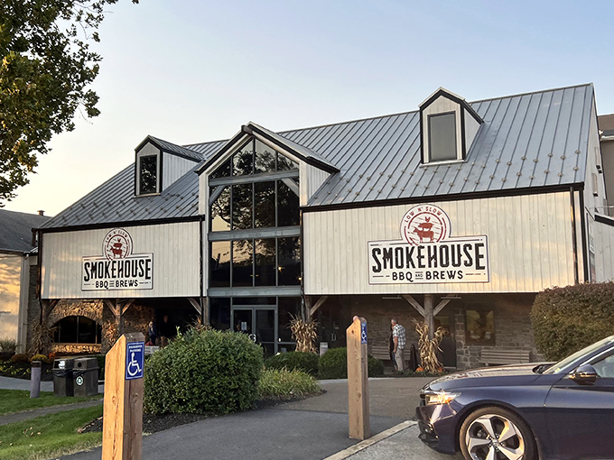 The barn-inspired exterior of Smokehouse BBQ & Brews promises what every barbecue pilgrim seeks: authentic, no-nonsense smoked goodness awaiting inside.