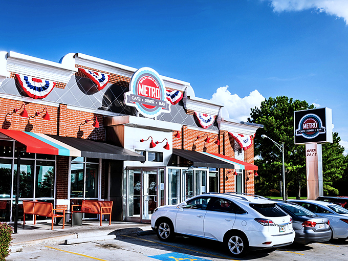 The brick facade of Metro Cafe Diner stands proudly in Stone Mountain, its patriotic bunting and welcoming entrance promising comfort food paradise within.