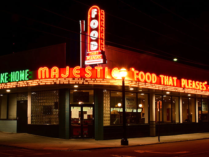 The same iconic sign that's guided night owls to 3 AM breakfasts has witnessed first dates, family gatherings, and countless Atlanta stories unfold beneath its electric glow.