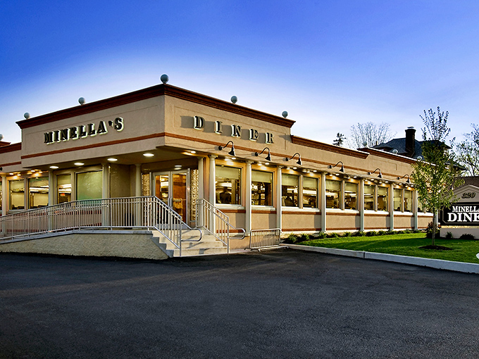 Minella's Diner glows with welcoming warmth at dusk, its classic architecture promising comfort food salvation for hungry travelers along Lancaster Avenue.