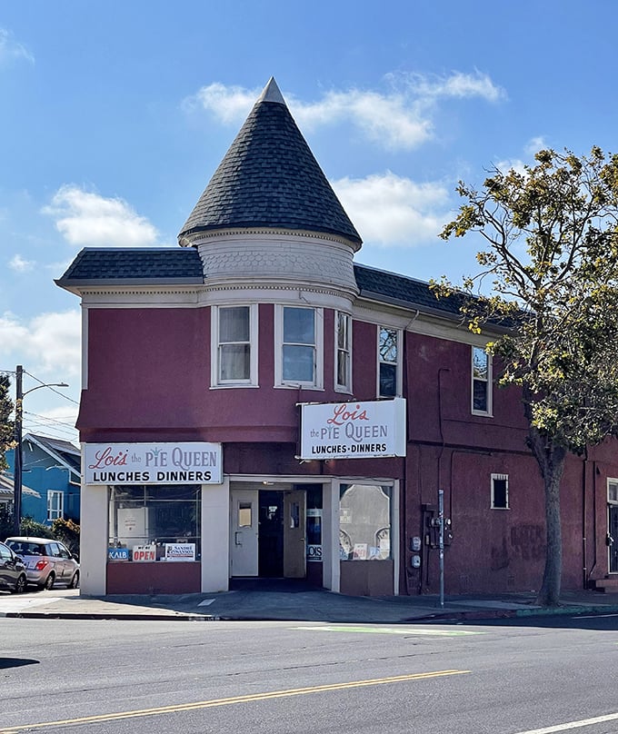 That turret isn't just architectural flair &ndash; it's a crown for Oakland royalty, where Southern comfort reigns supreme in burgundy splendor.