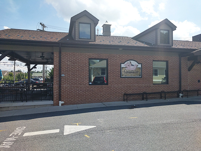 The unassuming brick exterior of CarterQue hides barbecue greatness like Clark Kent's glasses hide Superman. No fancy frills, just smoky thrills await.