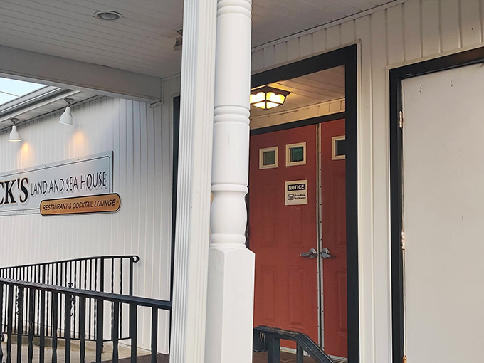 The golden sunset bathes Beck's Land & Sea House in warm light, its lighthouse-inspired exterior promising maritime delights in the heart of Pennsylvania's rolling countryside.