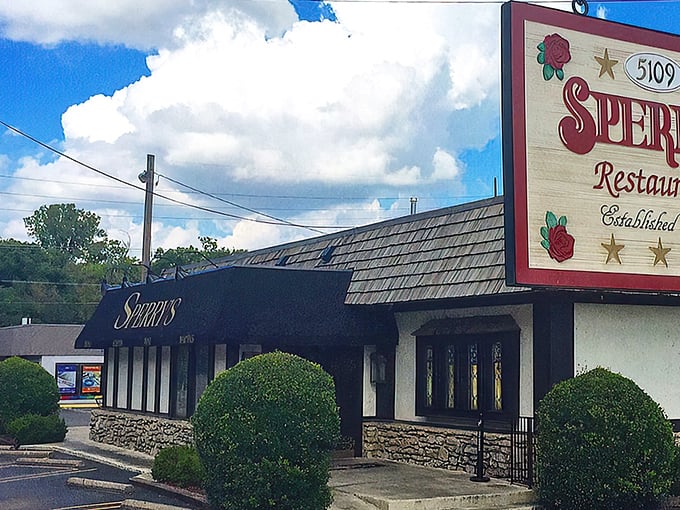 The classic black awning and stone foundation of Sperry's Belle Meade location stands as Nashville's answer to old-school steakhouse tradition. Unpretentious excellence awaits. 