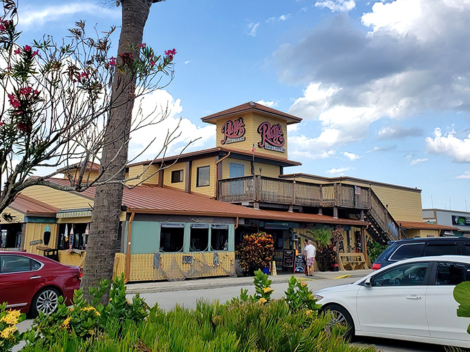 "The sunshine-yellow exterior of Rusty's stands like a beacon for seafood lovers, promising Florida flavors without the fuss or pretension."