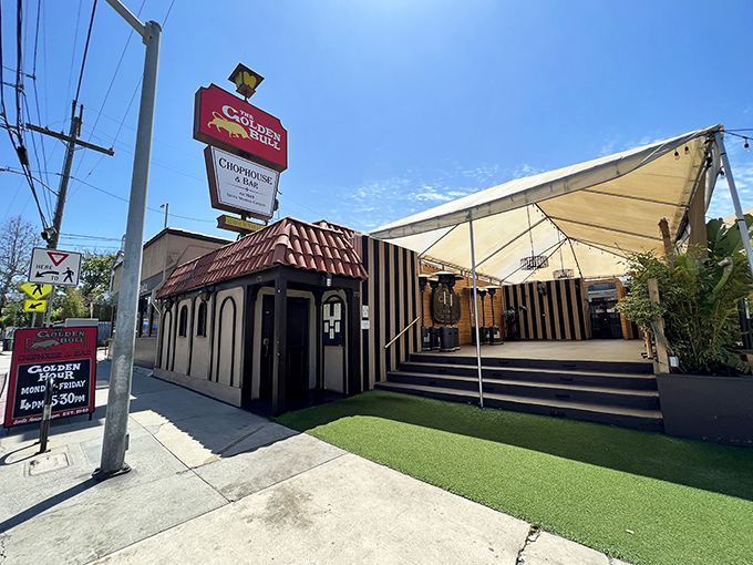Step into a world where outdoor dining feels like a secret garden party, complete with striped awnings and California sunshine.