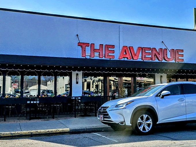 The Avenue's iconic red signage against crisp white walls isn't just a restaurant front&mdash;it's a beacon for carnivores with discerning taste buds.