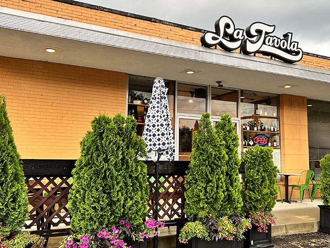 The unassuming white brick fa&ccedil;ade of La Tavola might not scream "culinary destination," but those evergreens are practically waving you in for pasta perfection.