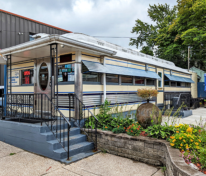 The classic stainless steel exterior of Park Dinor gleams like a time capsule, inviting hungry travelers to step back into a simpler era of American dining.