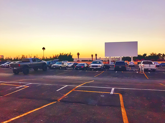 The magic hour at Paramount Drive-In, when the sky puts on its own show before the feature presentation begins.