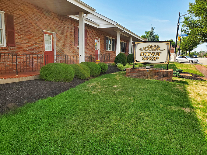 The unassuming brick exterior of Bill's Donut Shop stands like a temple to fried dough, promising sugary salvation to all who enter.