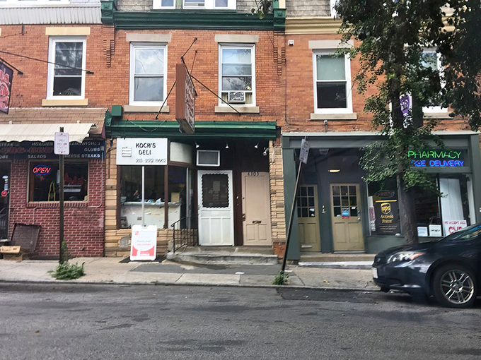 A humble storefront hiding culinary greatness. Koch's Deli's unassuming brick exterior in University City belies the sandwich masterpieces created within.