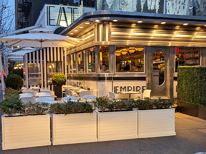 The gleaming chrome exterior of Empire Diner glows like a beacon of hope for the hungry wanderer. Classic New York, reimagined.