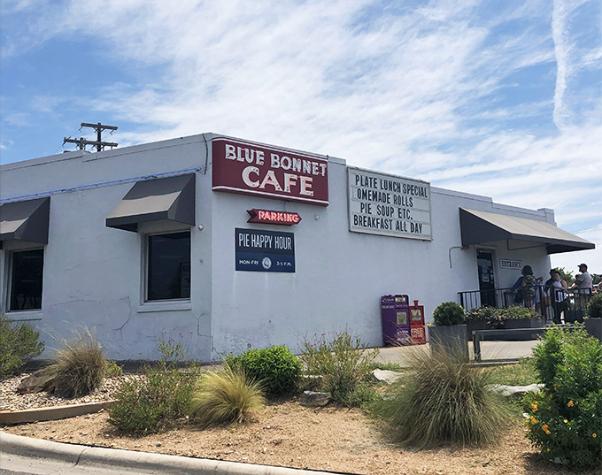 That iconic red sign promises comfort food paradise. The "Pie Happy Hour" notice is like a beacon for dessert enthusiasts.