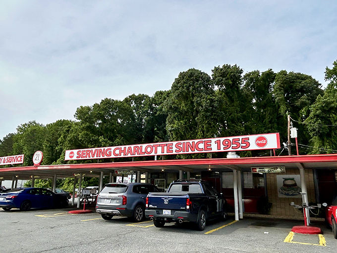 The red-trimmed canopy of South 21 has sheltered hungry Charlotteans since 1955, a time capsule of Americana serving up nostalgia and deliciousness in equal measure.