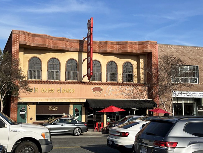 That brick facade isn't just charming architecture—it's containing enough mouthwatering smoky aromas to make vegetarians question their life choices.
