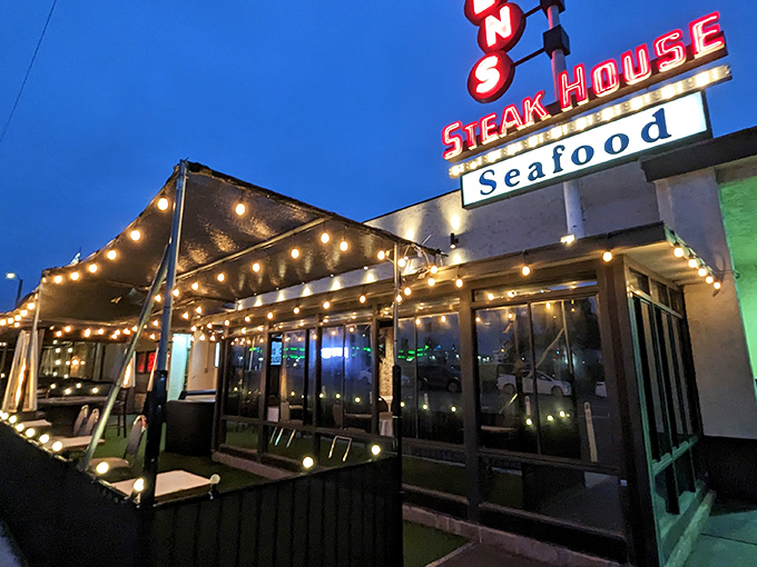Classic steakhouse glamour meets California cool with this illuminated fa&ccedil;ade. The string lights promise magic before you even step inside.