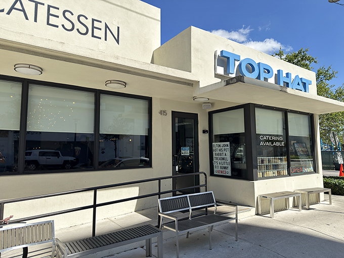 The bright blue "TOP HAT" sign beckons like a beacon of deli salvation on Fort Lauderdale's Federal Highway. Your stomach is already thanking you.