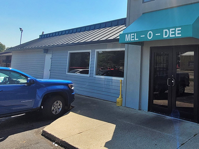 The unassuming blue exterior of Mel-O-Dee belies the culinary treasures within&mdash;like finding a Michelin-worthy meal in your favorite aunt's living room.