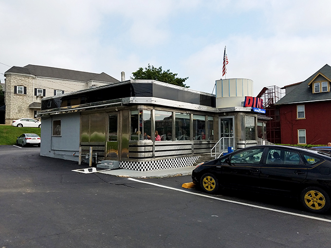 Classic Americana in stainless steel glory. The Downingtown Diner's daytime profile stands as a monument to the golden age of roadside dining.