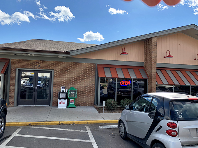 The unassuming brick exterior with cheerful striped awnings houses more culinary joy than most fancy establishments with valet parking.