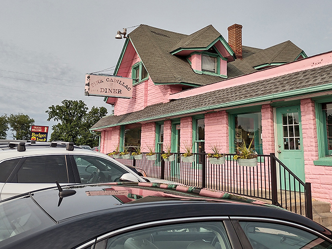 Like a flamingo in a world of pigeons, the Pink Cadillac Diner stands proudly along Route 11, beckoning hungry travelers with its unmistakable rosy glow. 
