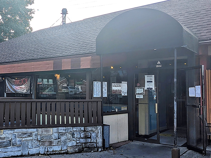 A welcoming brown awning beckons hungry visitors &ndash; the pizza equivalent of a "come hither" look that's impossible to resist.