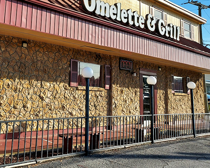 The stone facade and vintage globe lights of Nicki's Omelette & Grill stand as a beacon to breakfast lovers. This Tampa institution promises comfort food without pretension.