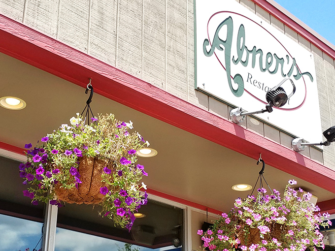 Abner's welcomes you with charming hanging flower baskets that add a splash of color against the simple exterior. Small touches that say "come on in, we've been expecting you."