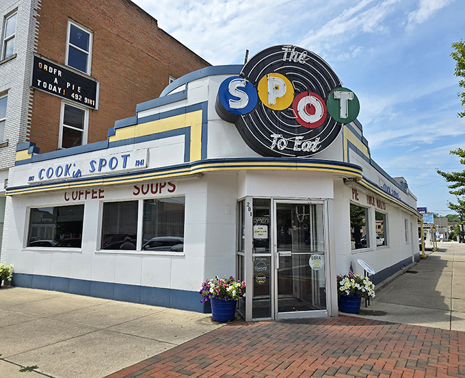 The architectural time machine that is The Spot Restaurant, with its iconic neon sign promising comfort food salvation to all who enter.