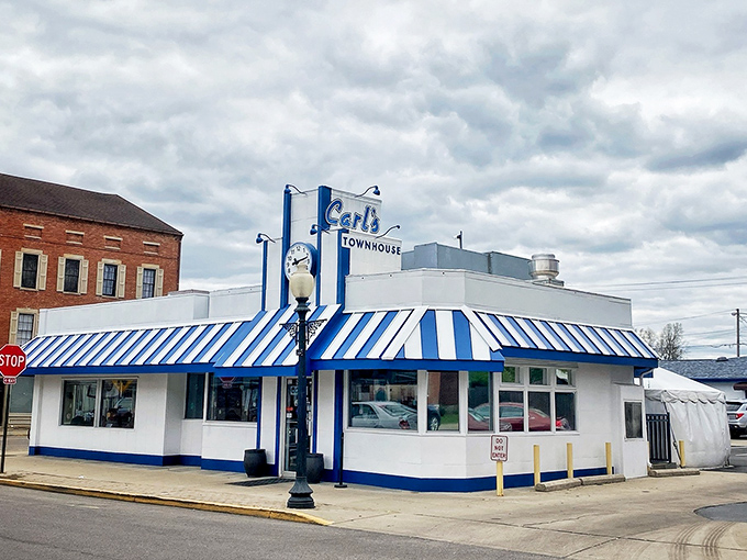 Another angle reveals Carl's iconic exterior&mdash;where the promise of comfort food has been drawing locals and travelers alike for generations.