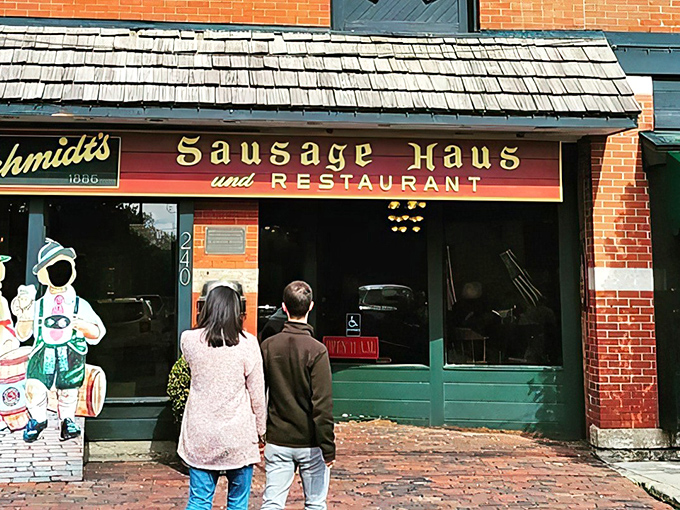 The iconic brick fa&ccedil;ade of Schmidt's welcomes hungry visitors with its charming wooden awning and German flags&mdash;a culinary embassy on Columbus soil.