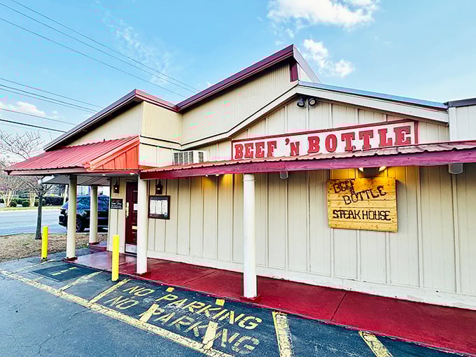 The unassuming exterior of Beef 'N Bottle stands like a time capsule on Charlotte's South Boulevard, promising carnivorous delights within its modest walls.