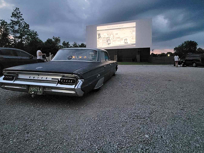 Classic cars and modern movies create the perfect time-travel experience at Starlite. Nothing says "American nostalgia" quite like this scene.
