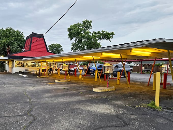The iconic red roof of Cranwill's beckons like a lighthouse for hungry travelers. Those yellow and red posts aren't just supporting the structure&mdash;they're holding up decades of delicious memories.