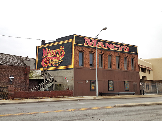 That bold red signage isn't just advertising – it's a promise. Mancy's brick façade has become synonymous with special occasions and "I deserve this" Tuesday nights alike.