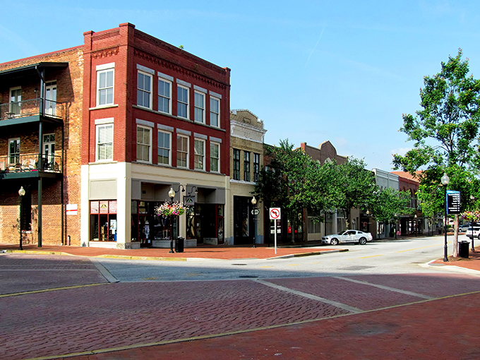 Historic brick buildings line Spartanburg's downtown streets, where modern businesses thrive in spaces that have witnessed over a century of Southern stories.